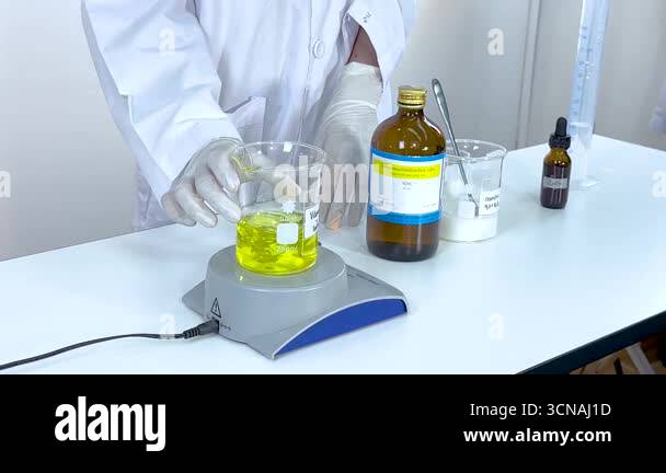 A scientist conducts an iodine clock reaction using vitamin C and ...