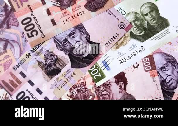Mexican paper money, pesos in various denominations. Mexican money as a ...