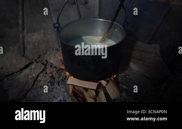 Making organic sheep cheese in wooden mountain Carpathian cheese ...