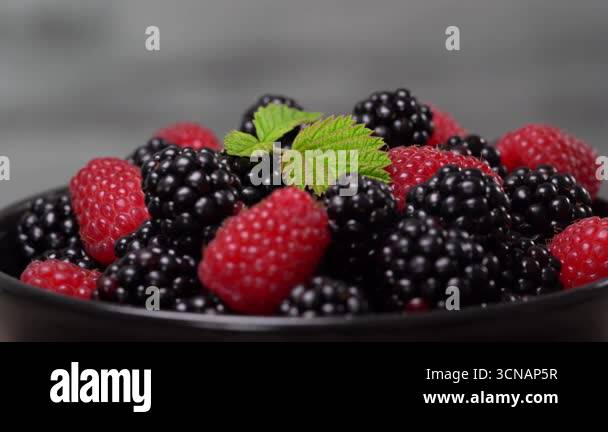 Background from fresh organic blackberries and raspberries. Lot of ripe ...