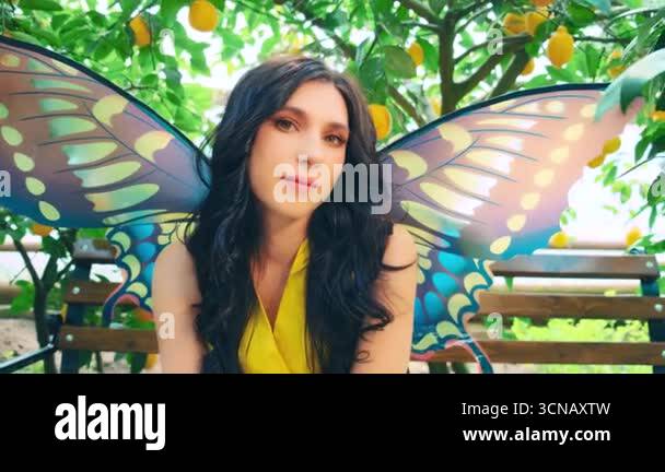 Fabulous fantasy girl elf, yellow dress, butterfly art wings. Portrait ...