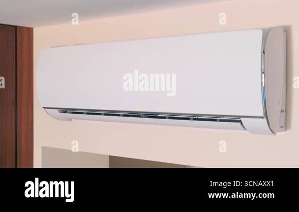 Close Up shot. The indoor unit of the air conditioner is attached to ...