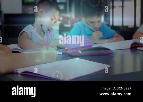 Camera panning into classroom revealing students writing notes, digital ...