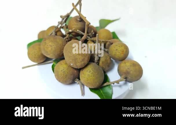 Longan. Fresh longan isolated on a white background Stock Video Footage ...