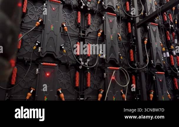 Backside of big LED screen monitor display. Texture of back view of LED panels with power input ...