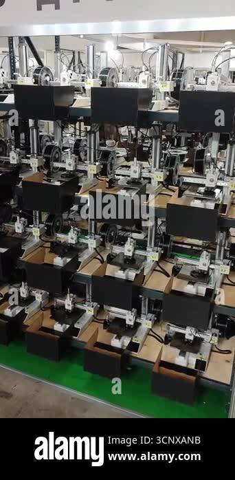 Kyiv, Ukraine, May 25, 2025: Many 3D printers printing object. 3D ...