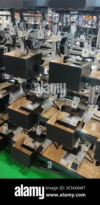 Kyiv, Ukraine, May 25, 2025: Many 3D printers printing object. 3D ...