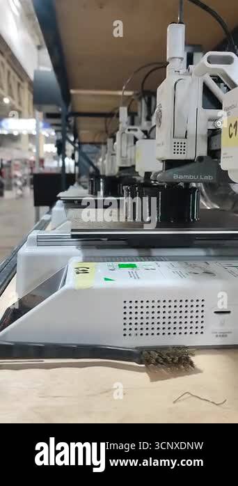 Kyiv, Ukraine, May 25, 2025: Many 3D printers printing object. 3D ...