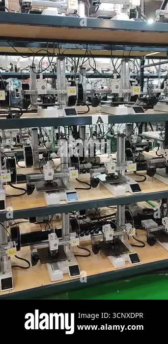 Many 3D printers printing object. 3D printers simultaneously printing ...
