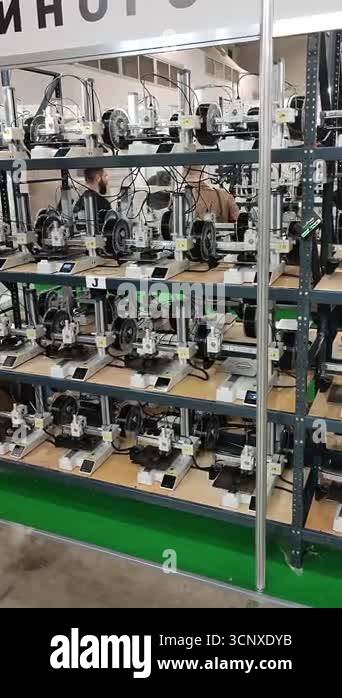 Kyiv, Ukraine, May 25, 2025: Many 3D printers printing object. 3D ...