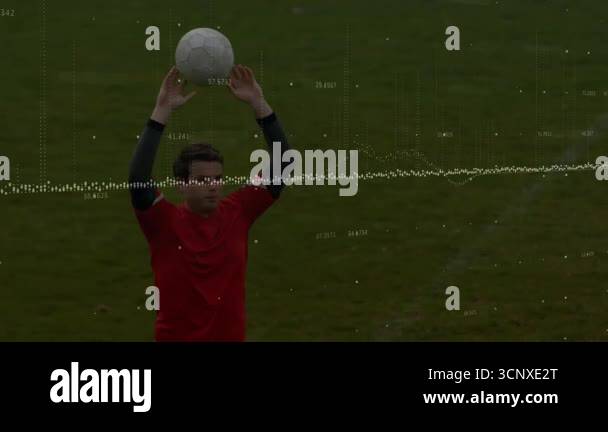 Athlete lifting ball on grass pitch triggers trajectory mapping throw ...
