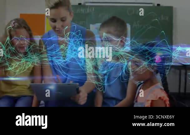 Teacher tapping tablet guiding children in classroom for learning with digital wave around ...