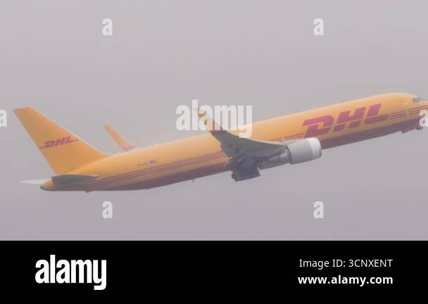 HONG KONG - JANUARY 26, 2025: Shot, Boeing 767 of DHL take off at Chek ...