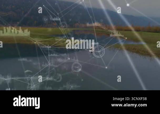 Male paddling canoe across wetlands, drifting causing network overlay ...
