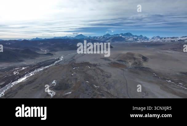 Video of a road running through a desolate, flat landscape with a ...