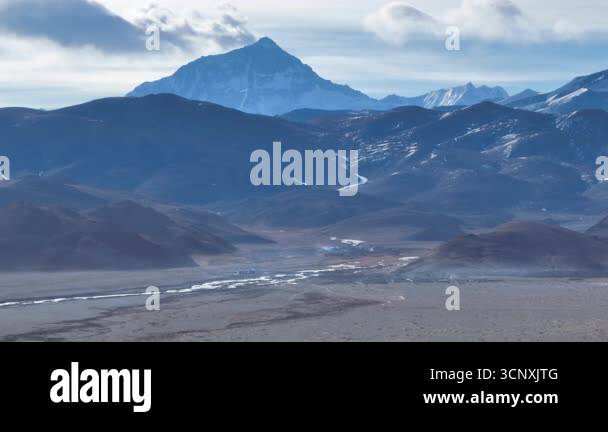 Video of a road running through a desolate, flat landscape with a ...