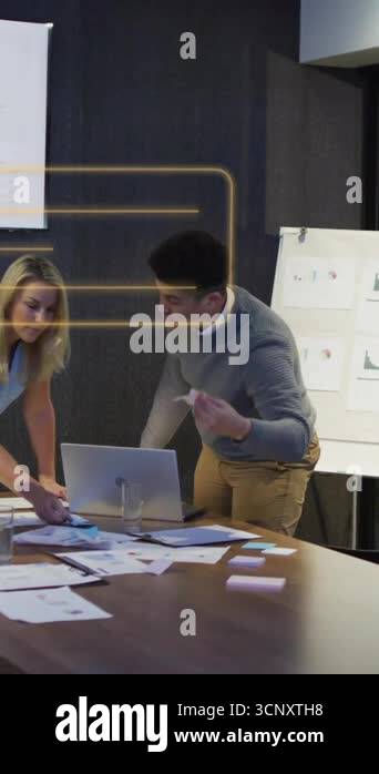 Collaborating over sales charts, business team analyzing data in modern ...