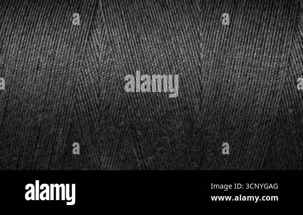black cotton threads with visible details. background Stock Video ...