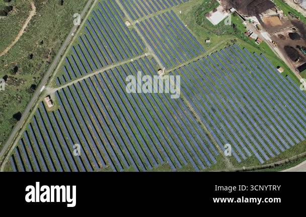 Aerial view of a large solar farm in Corsica, France capturing rows of ...