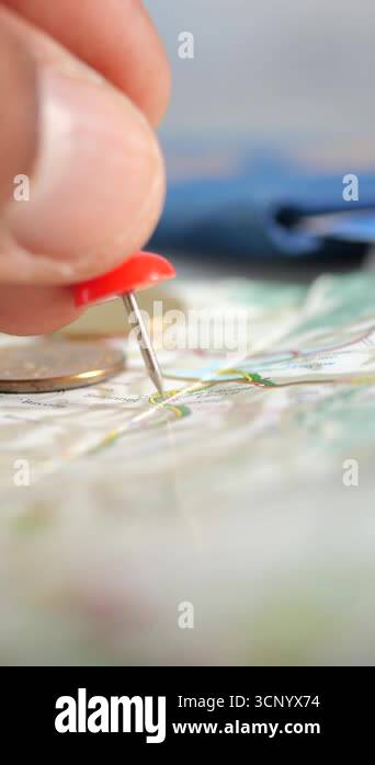 Hand places pin on Stock Videos & Footage - HD and 4K Video Clips - Alamy