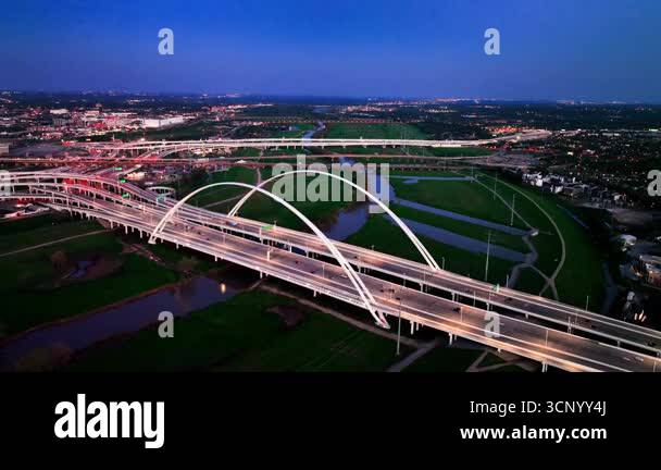 Two arches of Margaret McDermott Bridge framing the famous Reunion ...