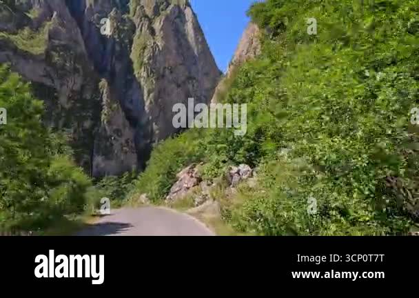 Driving along the serpentine mountain roads in Azerbaijan. A mountain ...