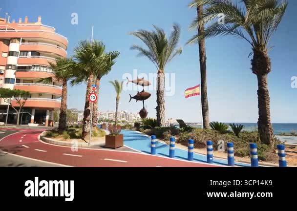 Benidorm, Spain - May 25, 2025: Distant view of rust toned tuna ...