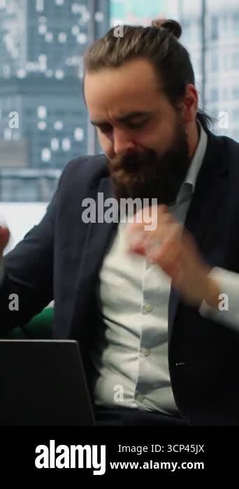 Vertical Video Proud satisfied CEO mimics air guitar singing and ...