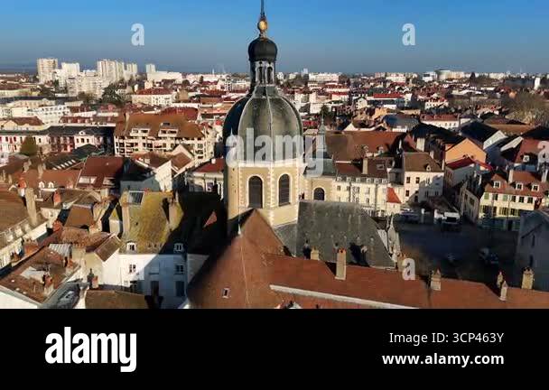 Aerial 360 degree orbit of cathedral in Chalon sur Saone France showing ...