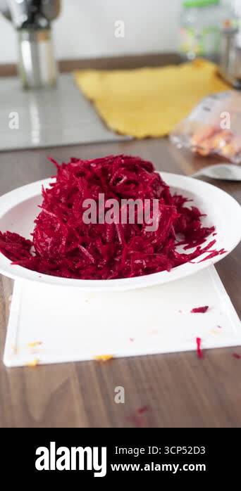 Vibrant and freshly grated beetroot, perfect and ready for salads ...
