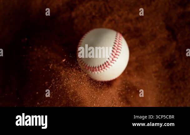 Super Slow Motion Detail Shot of Baseball Ball with Clay Explosion ...