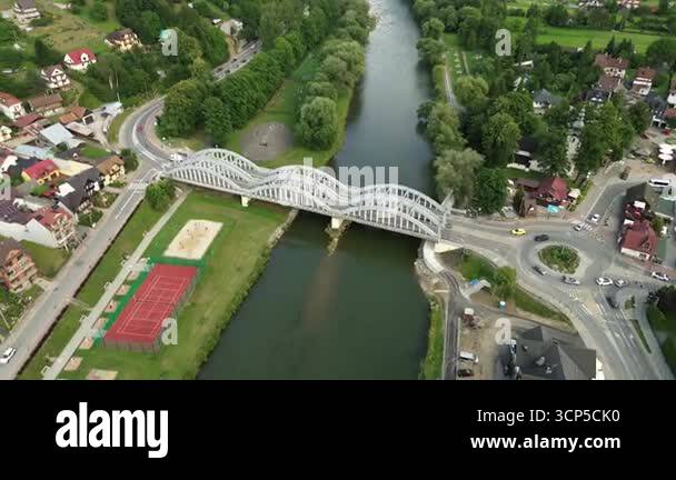 Curved bridge with blue steel structure Stock Video Footage - Alamy