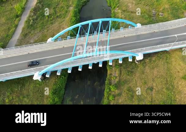Curved bridge with blue steel structure Stock Video Footage - Alamy