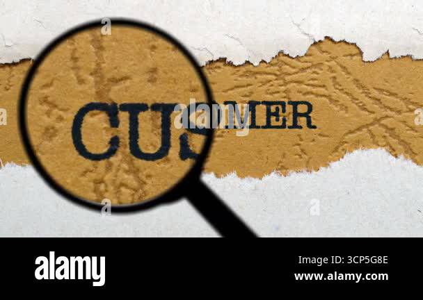 Magnifying Glass Over Torn Paper Revealing the Word Customer Stock ...