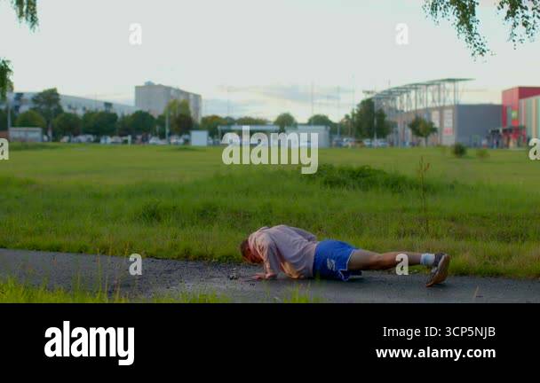 In this fitness video, a man shows dedication through pushups and a ...