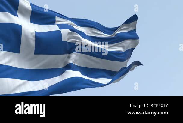 Close-up of national flag of Greece waving in the wind on a clear day ...
