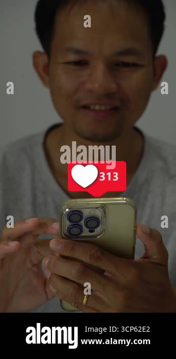 a man using smart phone for like and love on social media. technology ...