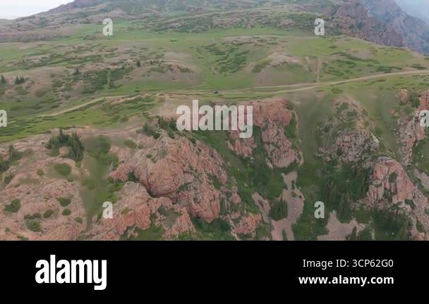 Majestic mountain terrain revealing rugged rocky landscape, densely ...