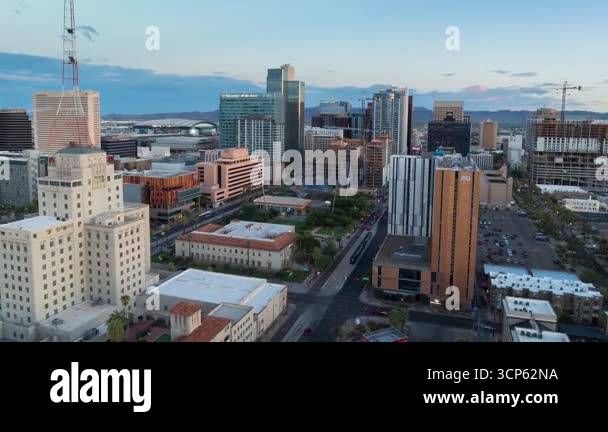 An aerial timelapse of downtown Phoenix by drone at sunset and blue ...