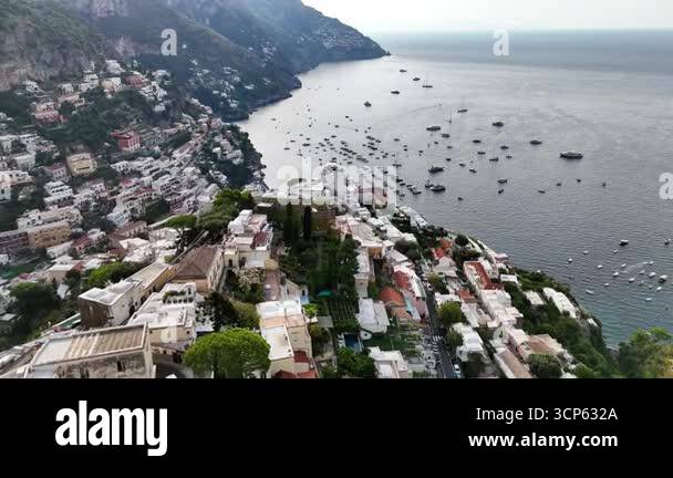Enjoy breathtaking aerial views of Positano, Italy. The vibrant houses ...