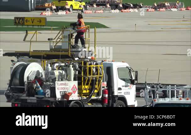 Chicago, Illinois, USA. Sep 1, 2025. An airport worker operates a ...