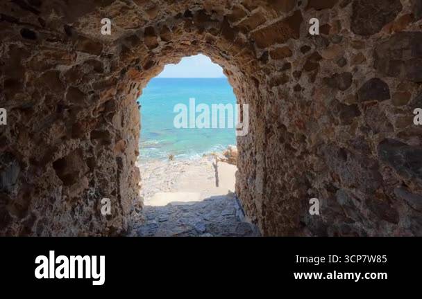 Sea arch through rocks Stock Videos & Footage - HD and 4K Video Clips ...
