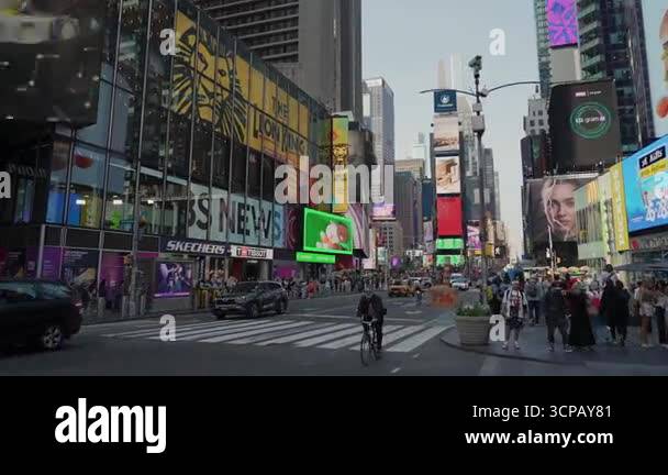 NEW YORK, USA - APRIL 17, 2025: A lively view of Times Square shows ...