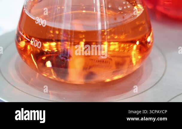 Chemical liquids. Laboratory glassware with colorful chemical liquids ...