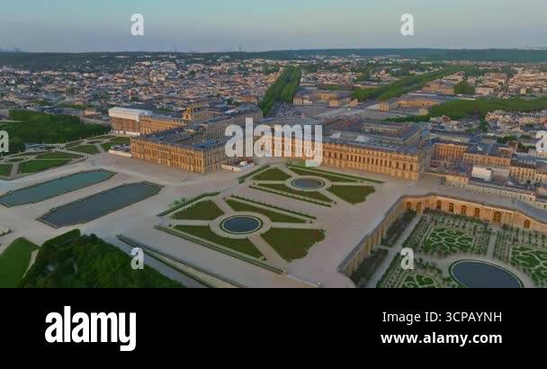 Aerial view of Palace of Versailles and the gardens surrounding it ...