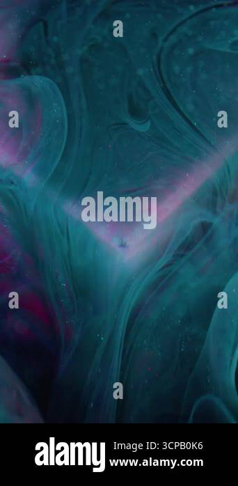 Vertical video. Art fluid. Dye splash. Turquoise dripping in violet ...