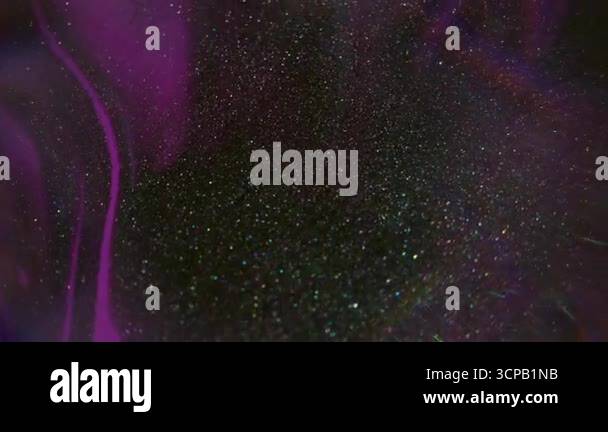 Glitter art. Beam texture. Defocused purple blue yellow color splash ...