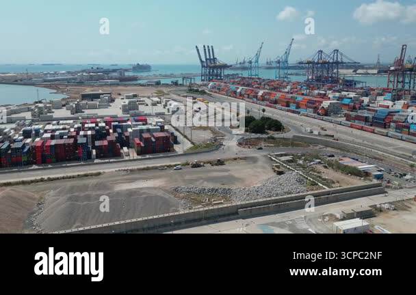 Aerial drone view of Valencia commercial port with shipping containers ...