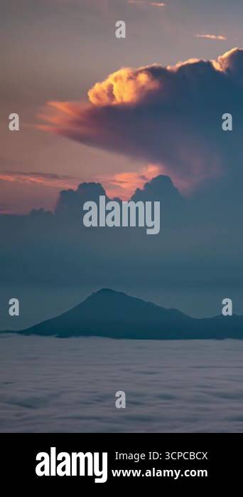 Vertical 9:16 timelapse shows huge storm clouds forming over foggy ...