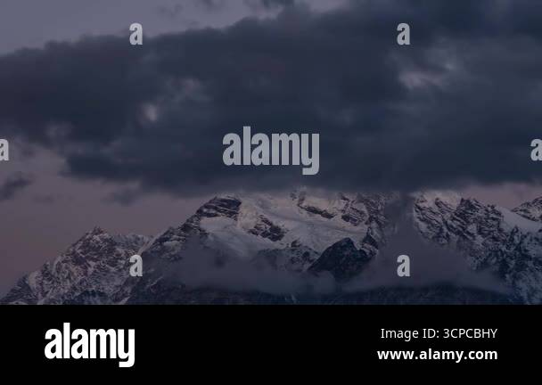 Peaceful time-lapse of dawn over Mount Tetnuldi Peak in the Caucasus ...